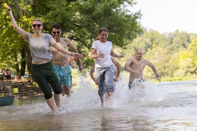 Group of Happy Friends Having Fun on River Stock Photo - Image of teens ...