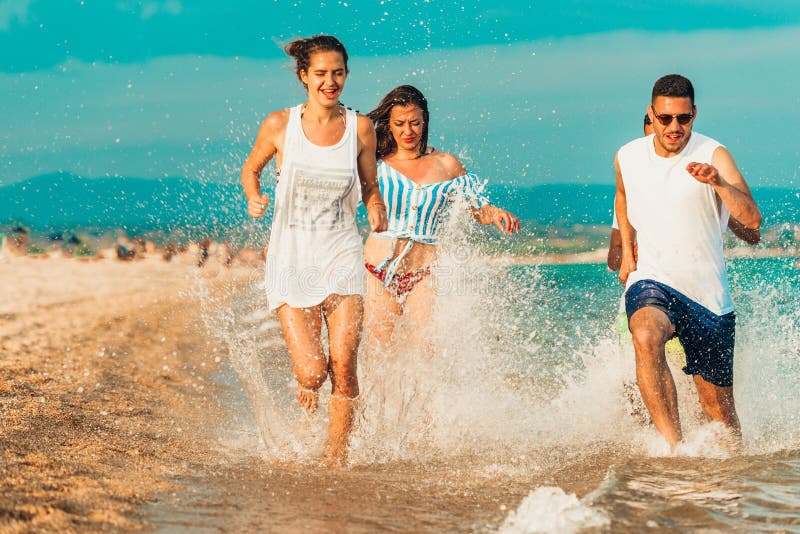 Group of Happy Friends Having Fun on Summer Beach Stock Photo - Image ...