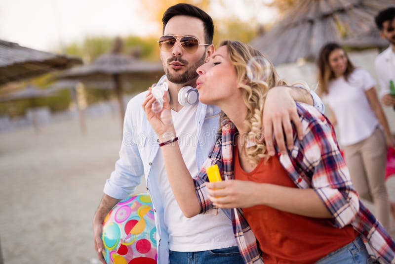 Group of Happy Friends Partying on Beach Stock Photo - Image of sunset ...