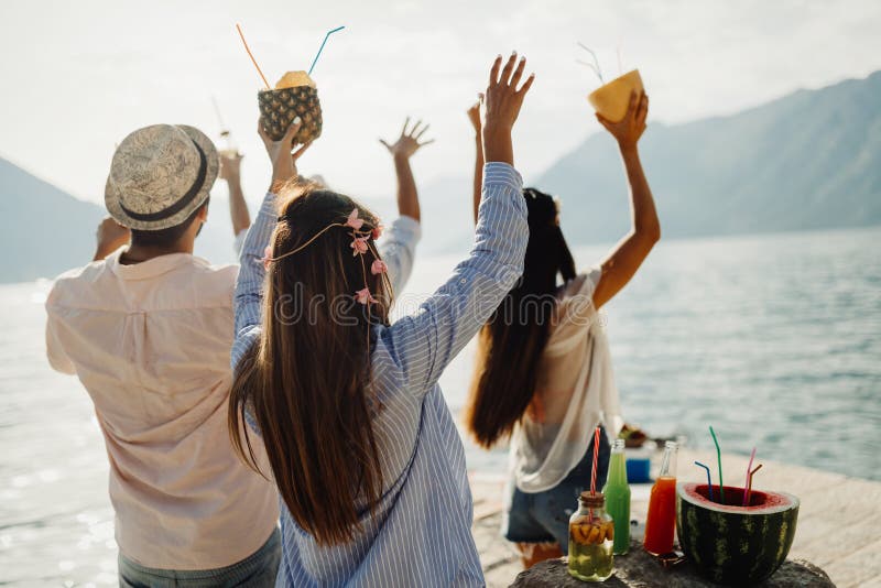 Group of Happy Friends Partying and Having Fun on Summer Vacation Stock ...