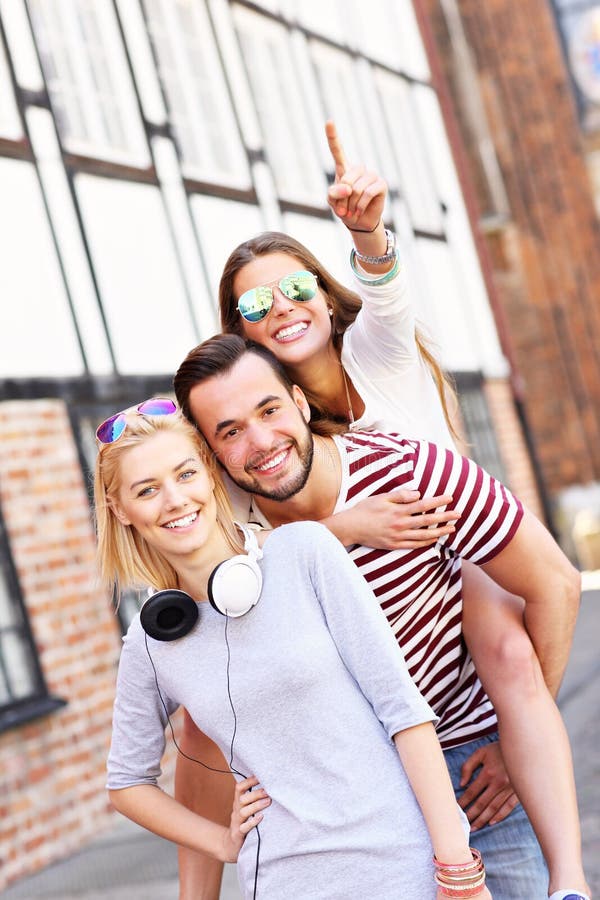 Group of happy friends stock photo. Image of city, adults - 55728098