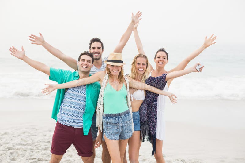 Group of Happy Friends Standing on the Beach Stock Image - Image of ...