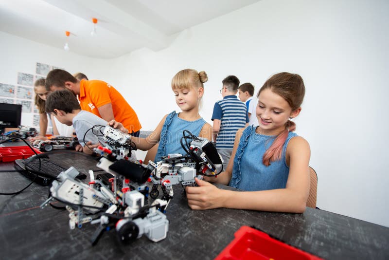 Group of Happy Kids with Laptop Computer Building Robots at Robotics ... Group of Happy Kids with Laptop Computer Building Robots at Robotics ...