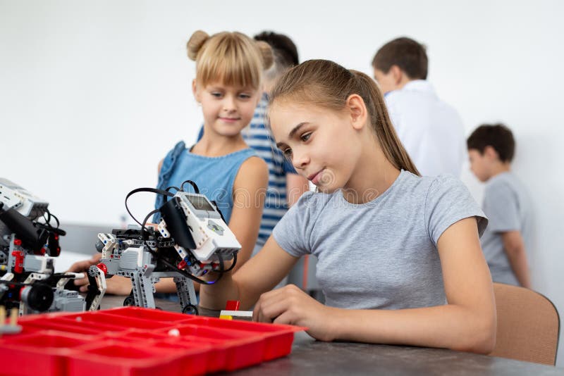 Group of Happy Kids with Laptop Computer Building Robots at Robotics ... Group of Happy Kids with Laptop Computer Building Robots at Robotics ...