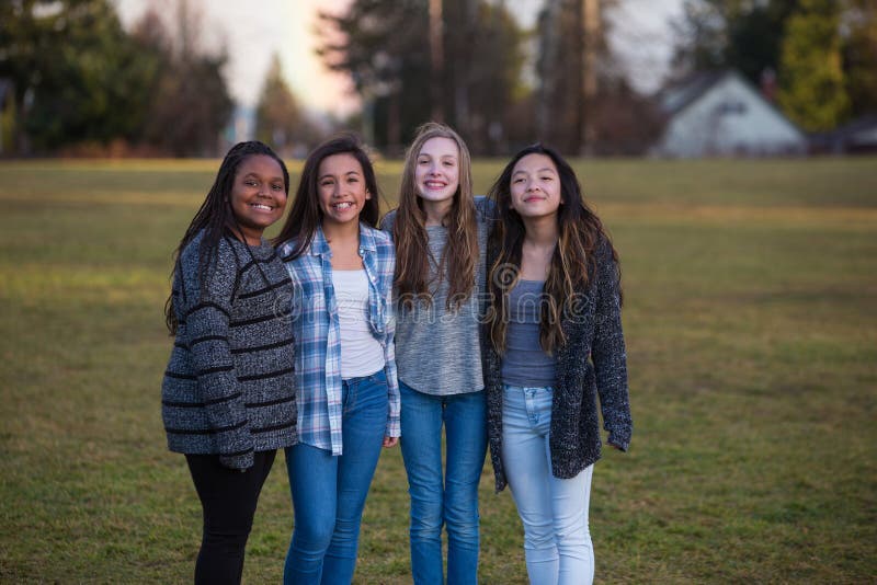 Group of Happy Kids Standing Together Outside Stock Photo - Image of ...