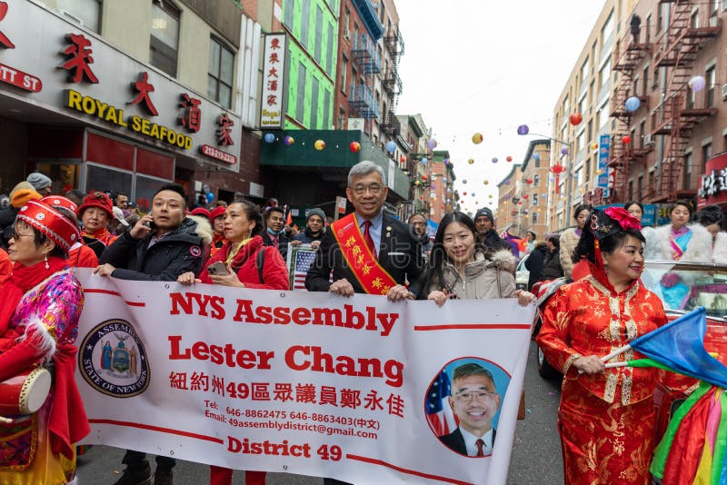 Group of Happy Multi-generational People Carrying Flags, Marching in a ...