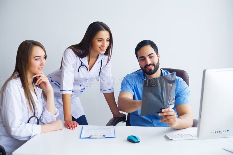 Group of Happy Multiracial Doctors Working Together in Clinic Stock ...