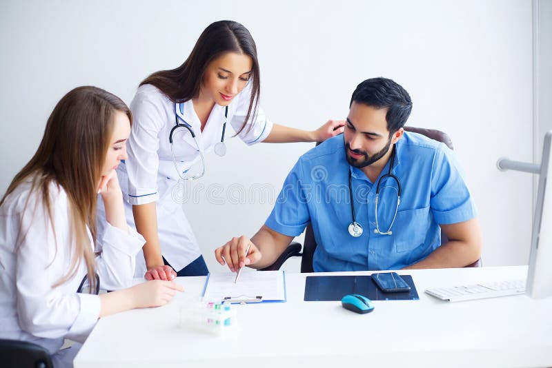Group of Happy Multiracial Doctors Working Together in Clinic Stock ...