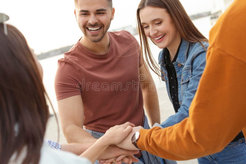 Group of Happy People Holding Hands Together Stock Image - Image of ...