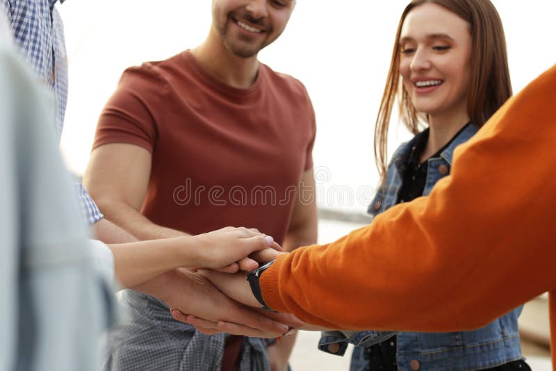 Group of Happy People Holding Hands Together Stock Photo - Image of ...
