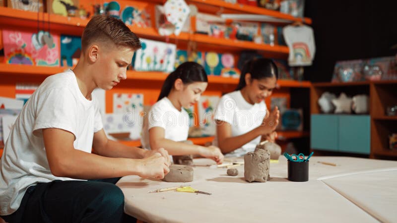 Group of Happy Smart Diverse Student Working with Clay at Workshop ...