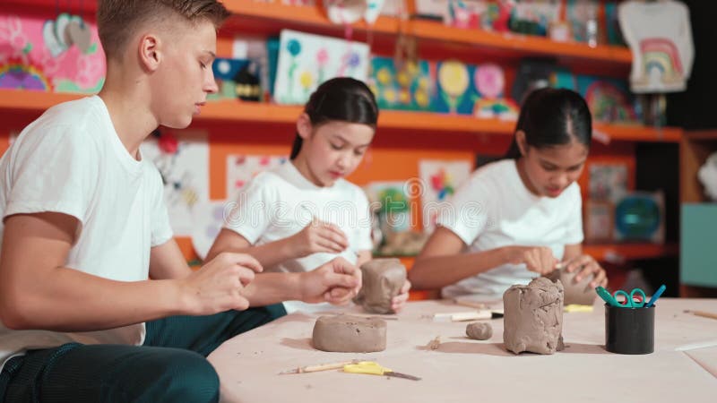 Group of Happy Smart Diverse Student Working with Clay at Workshop. Edification Stock Footage ...