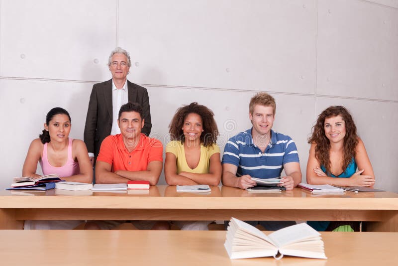 Group of Students Sitting Down with Lecturer Stock Photo - Image of ...