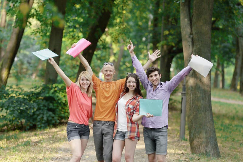 Group of Happy Students in the City Park Stock Photo - Image of ...