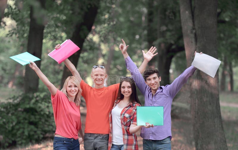 Group of Happy Students in the City Park Stock Image - Image of ...