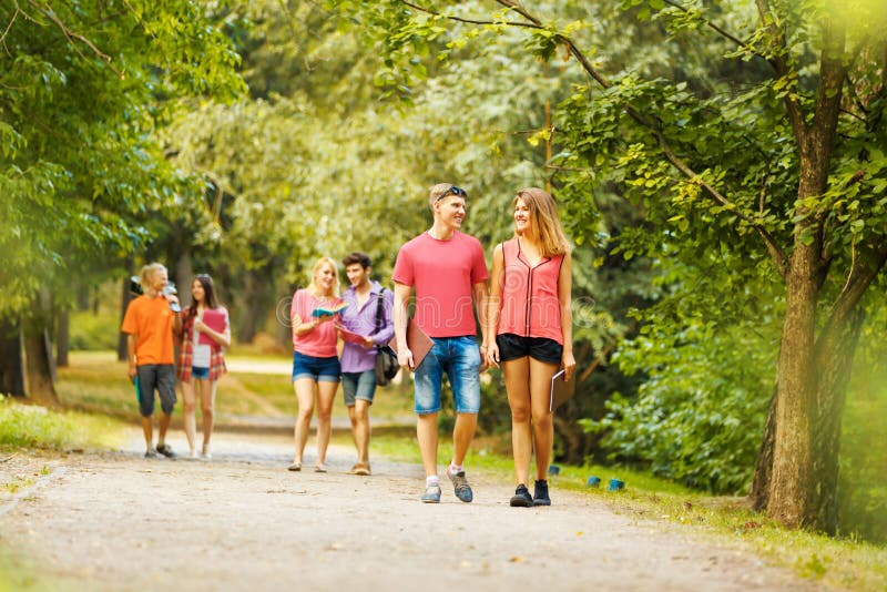 Group of Happy Students in a Park Stock Image - Image of female, adult ...
