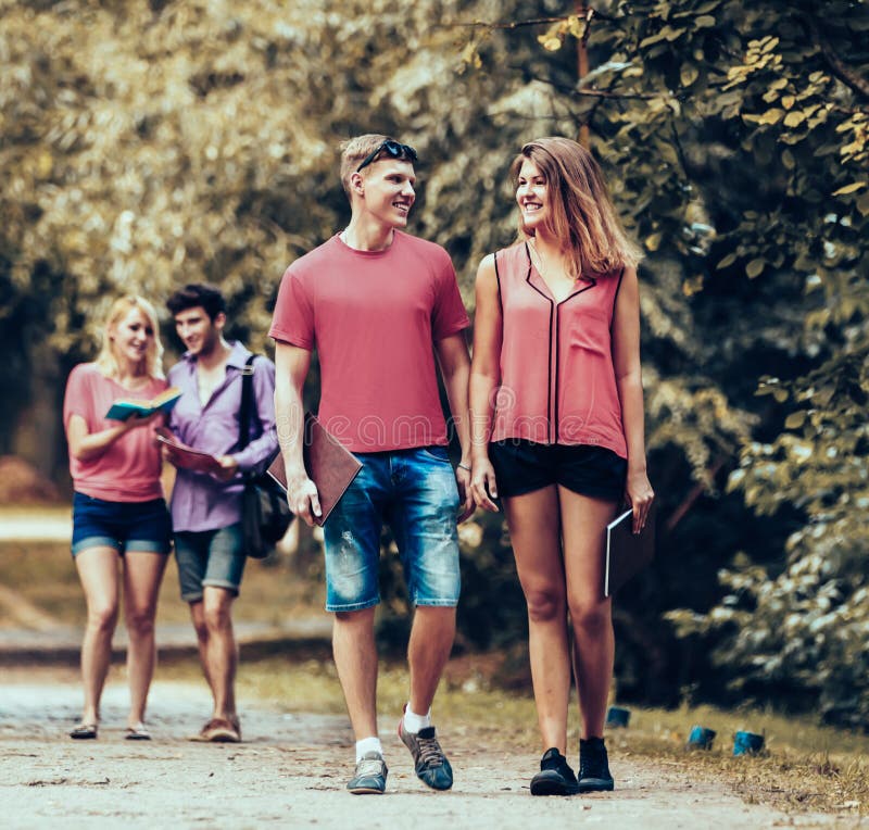 Group of Happy Students in a Park on a Sunny Day Stock Photo - Image of ...