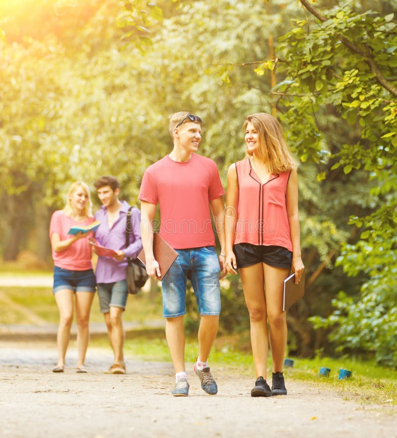 Group of Happy Students in a Park on Sunny Day.. Stock Photo - Image of ...