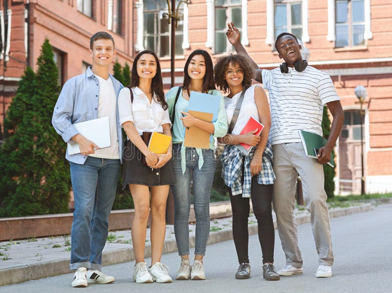 Group of Happy Students Posing Outdoors after Lecture in University ...