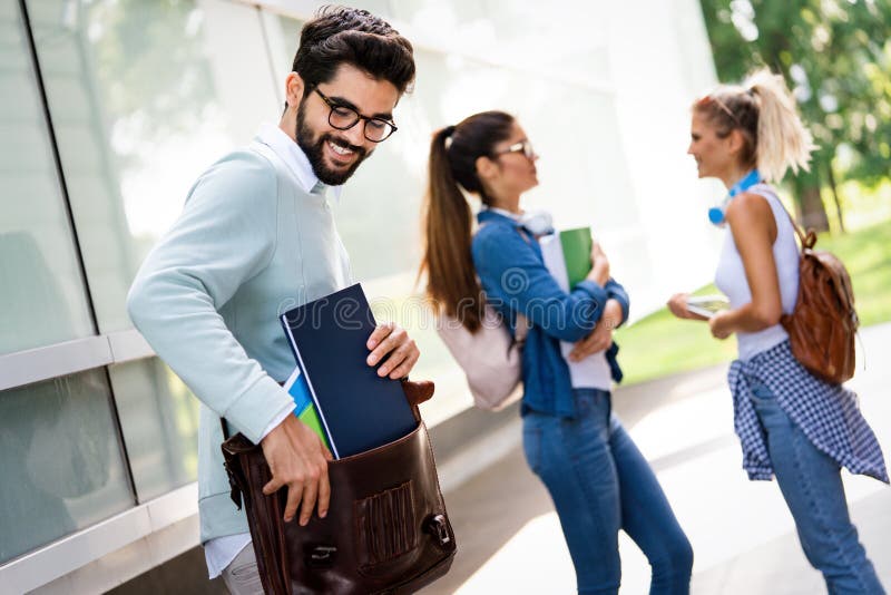 Group of Happy Students Studying, Preparing Together for Exam Ourdoor ... Group of Happy Students Studying, Preparing Together for Exam Ourdoor ...