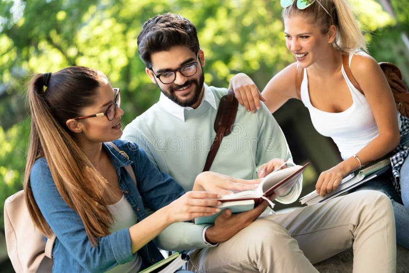 Group of Happy Students Studying, Preparing Together for Exam Ourdoor ...