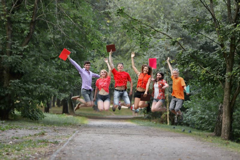 Group of Happy Students on the Track in the Park Stock Image - Image of ...