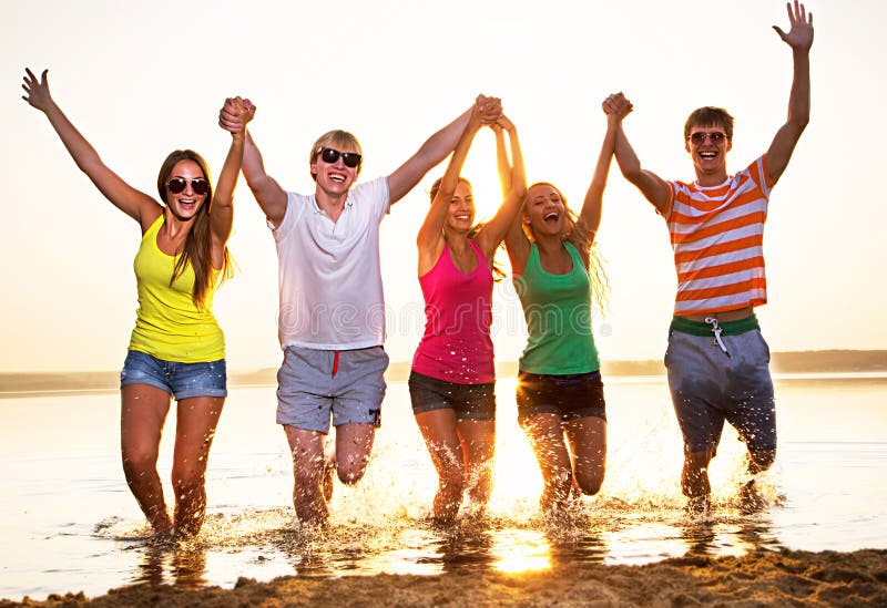 Teenagers on the beach stock image. Image of teen, group - 23499383