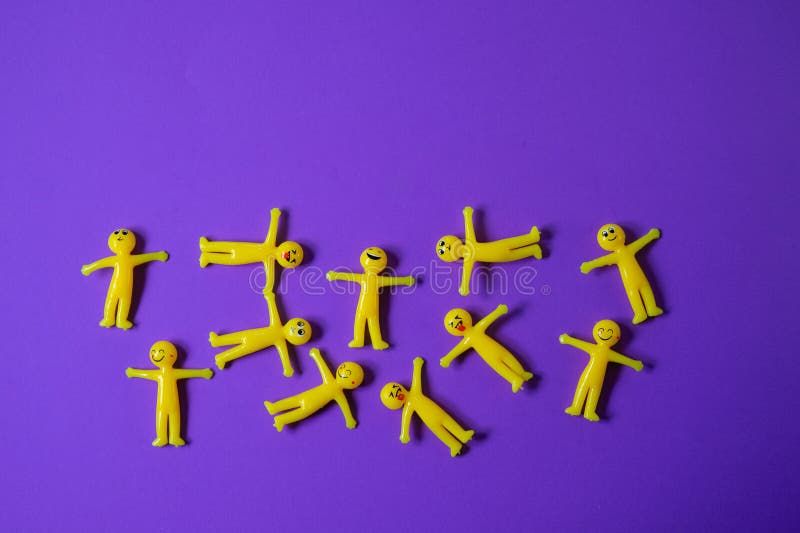 A Group of Happy Yellow Figures Stock Photo - Image of yellow, design ...