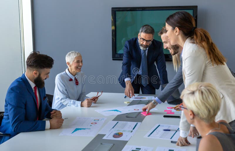 Group of Happy Young Business People in a Meeting at Office Stock Image ...