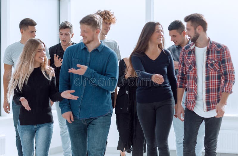 Group of Happy Young Employees Discussing a New Business Stock Photo ... Group of Happy Young Employees Discussing a New Business Stock Photo ...