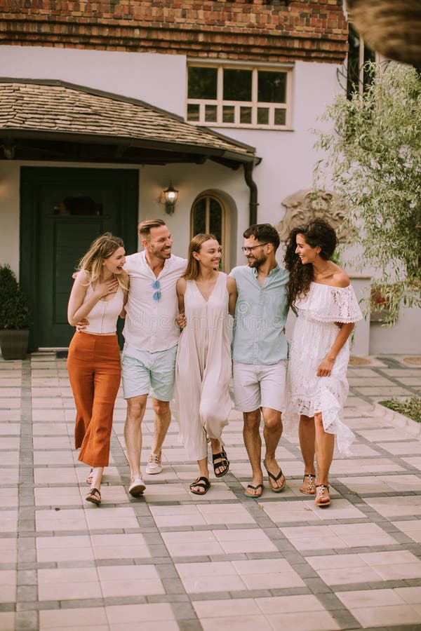 Group of Happy Young People Walking and Cheering Together Stock Image ...