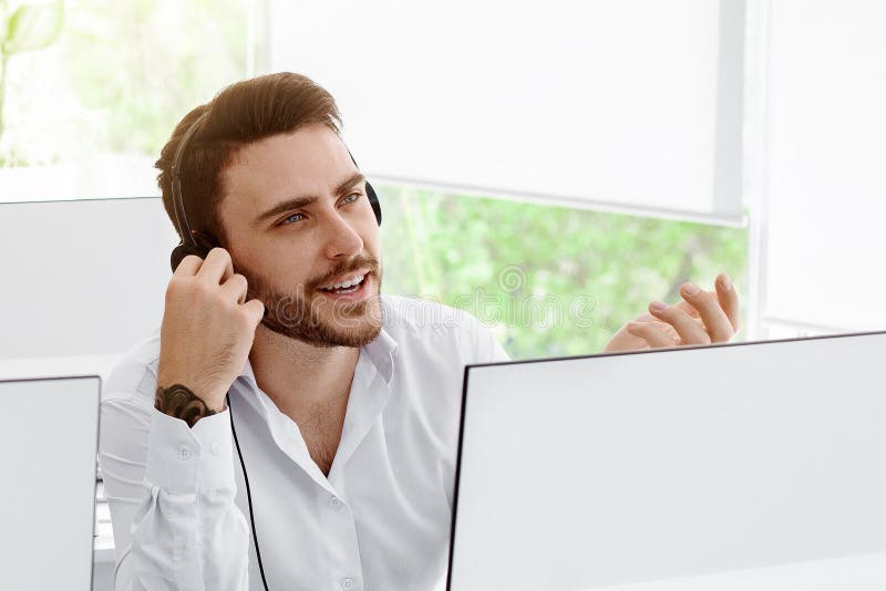 Group of Helpline Operators at Work in Modern Call Center Office Stock ...