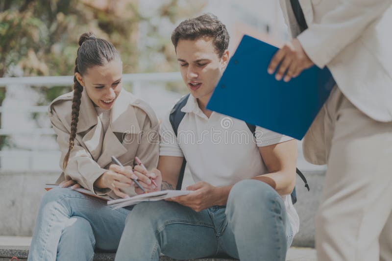 High School Students Receiving Guidance from Professor Outdoors Stock ...