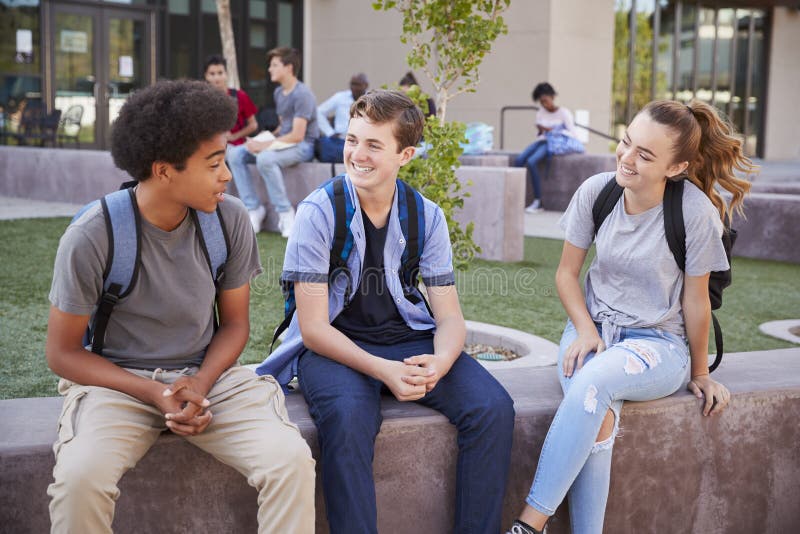 Group of High School Students Hanging Out during Recess Stock Photo ...