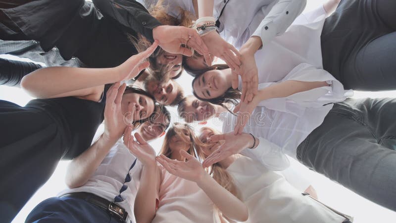 The Concept of Friendly Friends and Teamwork. Cheerful Friends Join ...