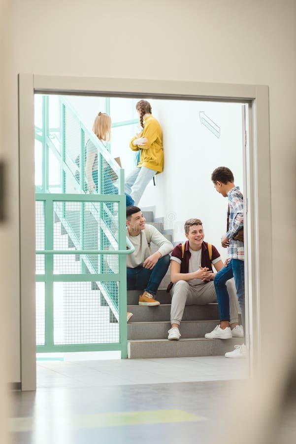 Group of High School Students Spending Time on Stairs at School Stock ...