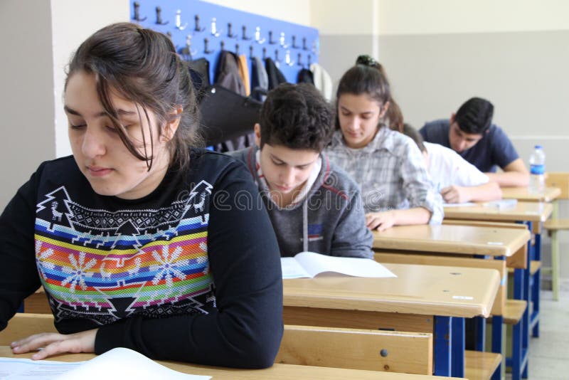 Group of High School Students Taking a Test in Classroom. Editorial ...