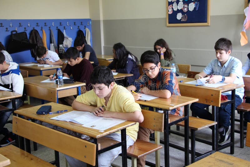 Group of High School Students Taking a Test in Classroom. Editorial ...