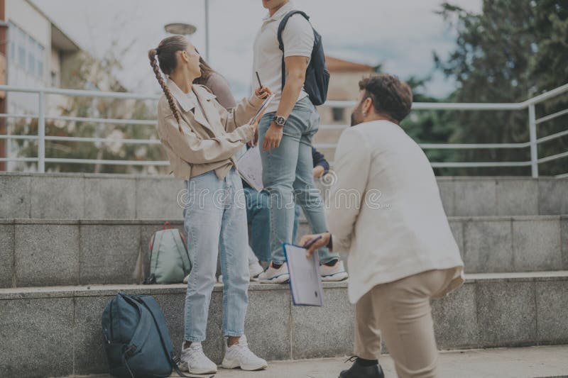 High School Students Collaborating Outdoor Tasks Professor Assistance ...