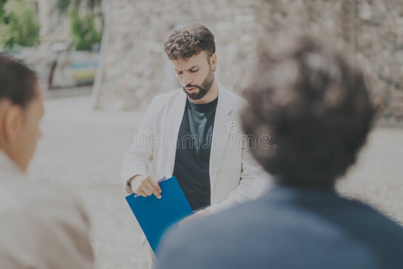 High School Students Teacher Solving Tasks Outdoors Together Stock ...