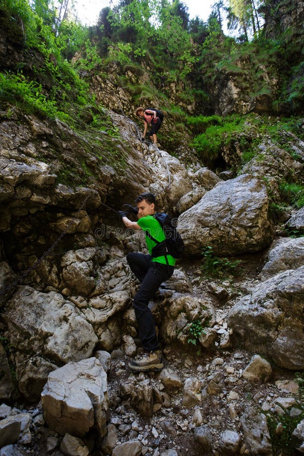 Group of Hikers with Backpacks on Difficult Trail Stock Photo - Image ...