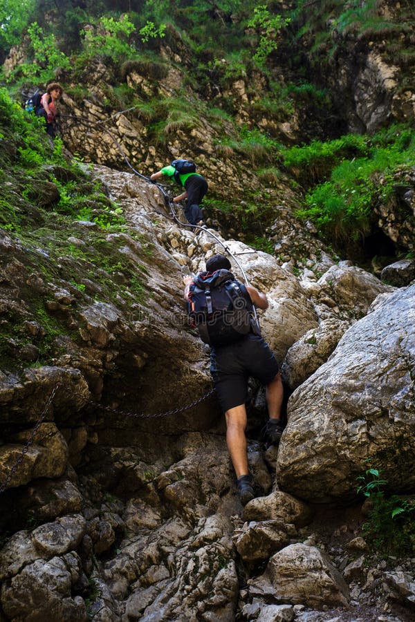 Group of Hikers with Backpacks on Difficult Trail Stock Image - Image ...