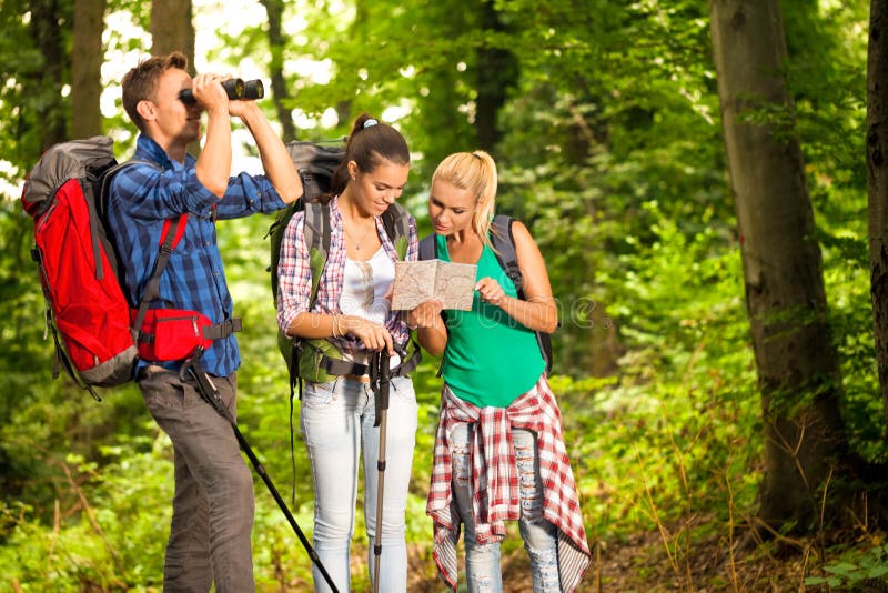 Group Of Hikers With Map And Binoculars Stock Image - Image of ...