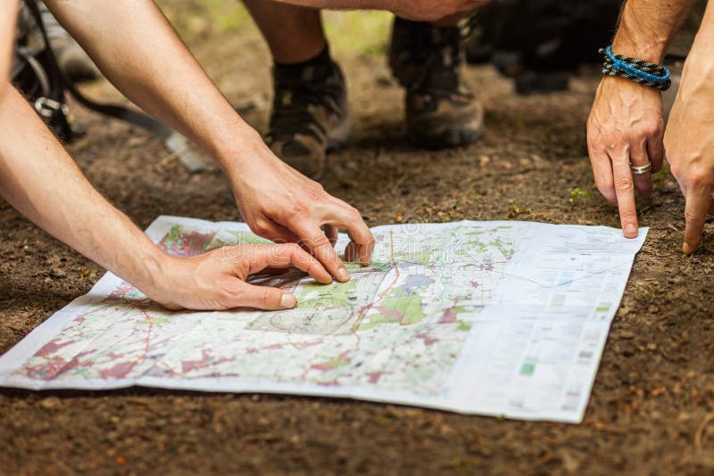 Navigating with Map and Compass Stock Photo - Image of exercise ...