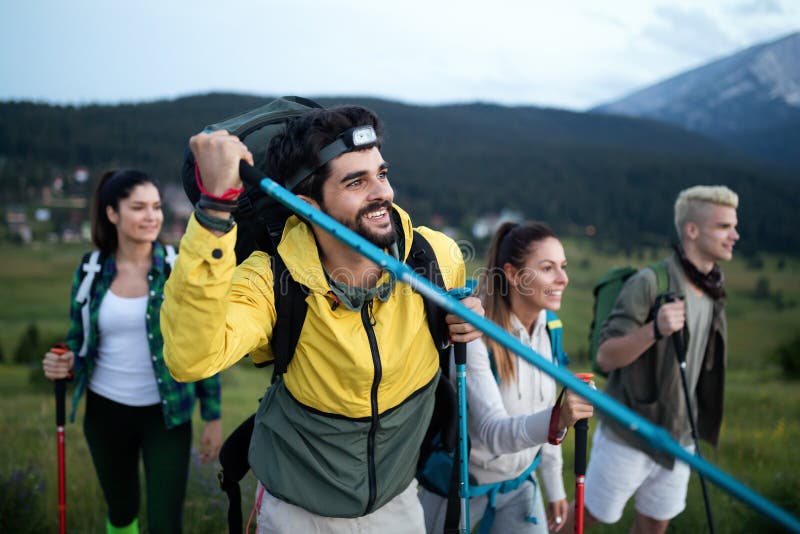 Group of Hikers Walking on a Mountain and Smiling Stock Image - Image ...