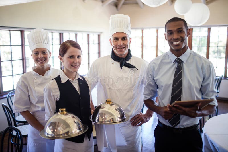 Group of Hotel Staffs Working in Kitchen Stock Photo - Image of ...