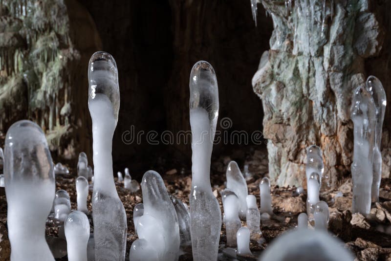 A Group of Ice Stalagmites in a Frozen Cave Stock Image - Image of ...