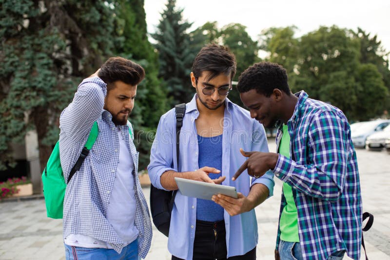 The Group of Indian Students Help Your Classmate with Navigation Stock ...