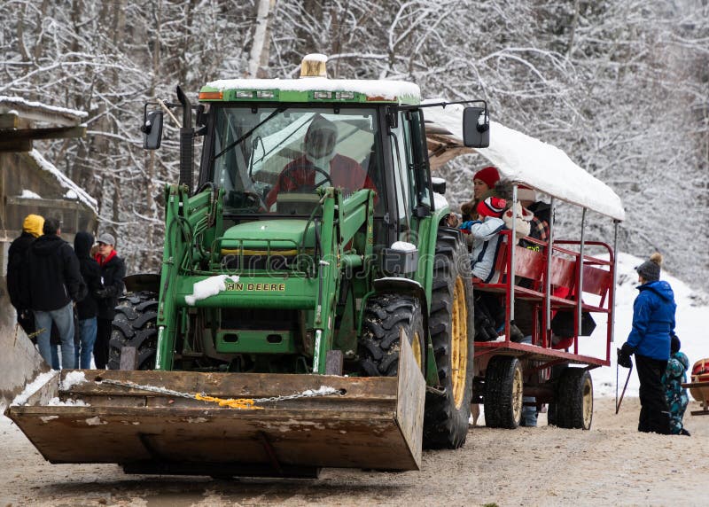 Group of Individuals Come Together for a Joyful Ride on a Tractor ...