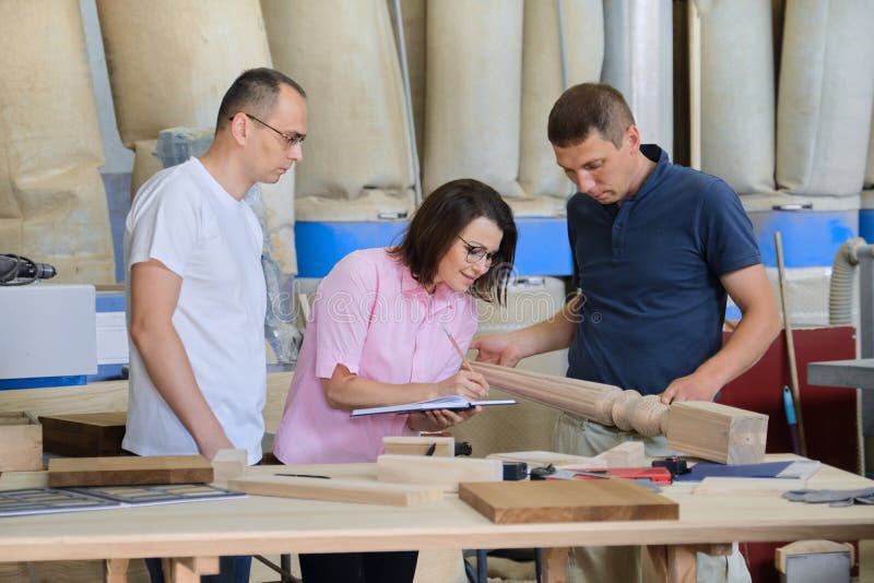 Group of Industrial People Working Together, Teamwork in Carpentry ...